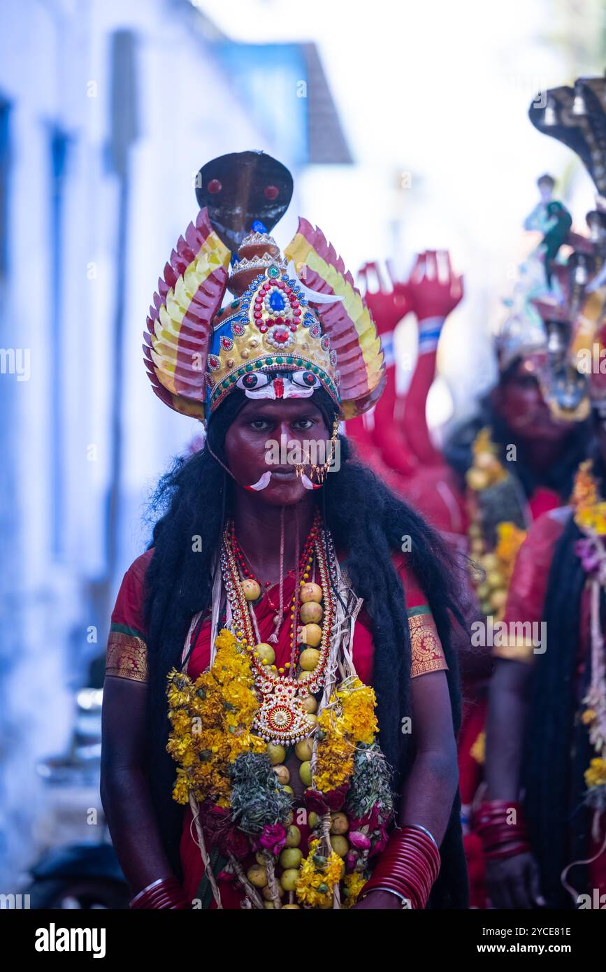 Kulasai Dasara, Portrait of indian hindu devotee with painted face and ...