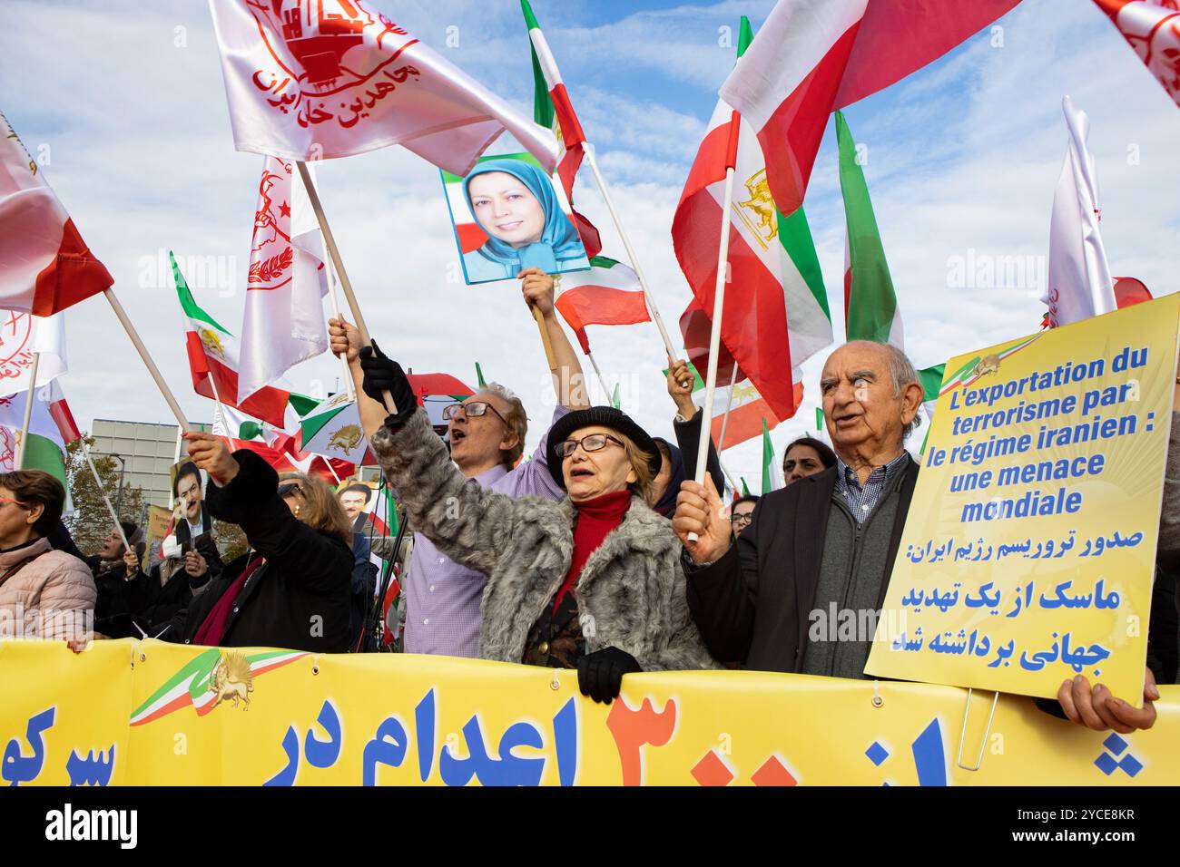 Iranians seen, with flag of Iran and pictures of Maryam Rajai, the ...