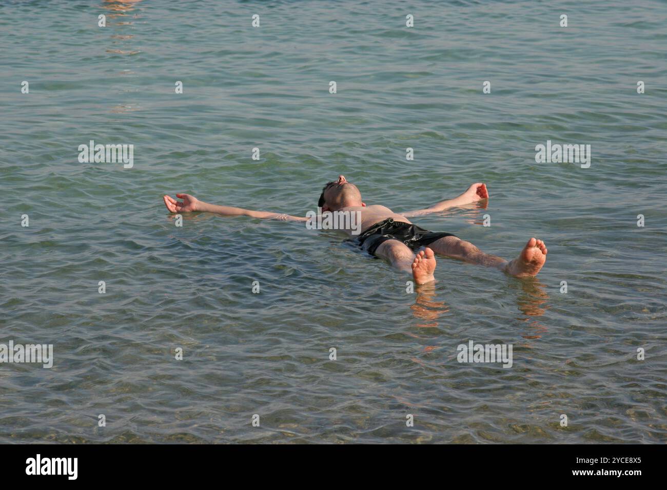 Man floating dead sea hi-res stock photography and images - Alamy
