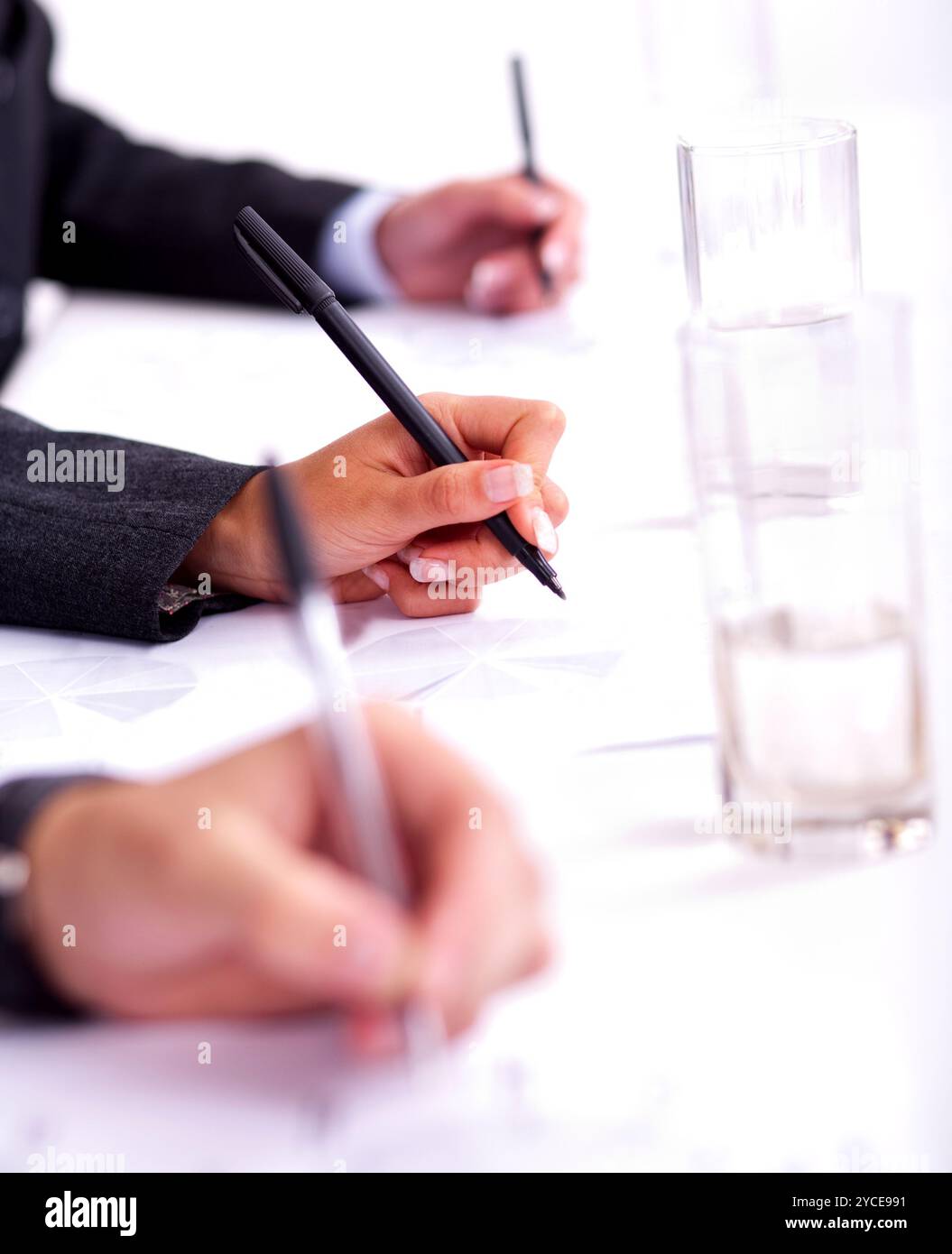 Business people taking notes in the business conference Stock Photo - Alamy