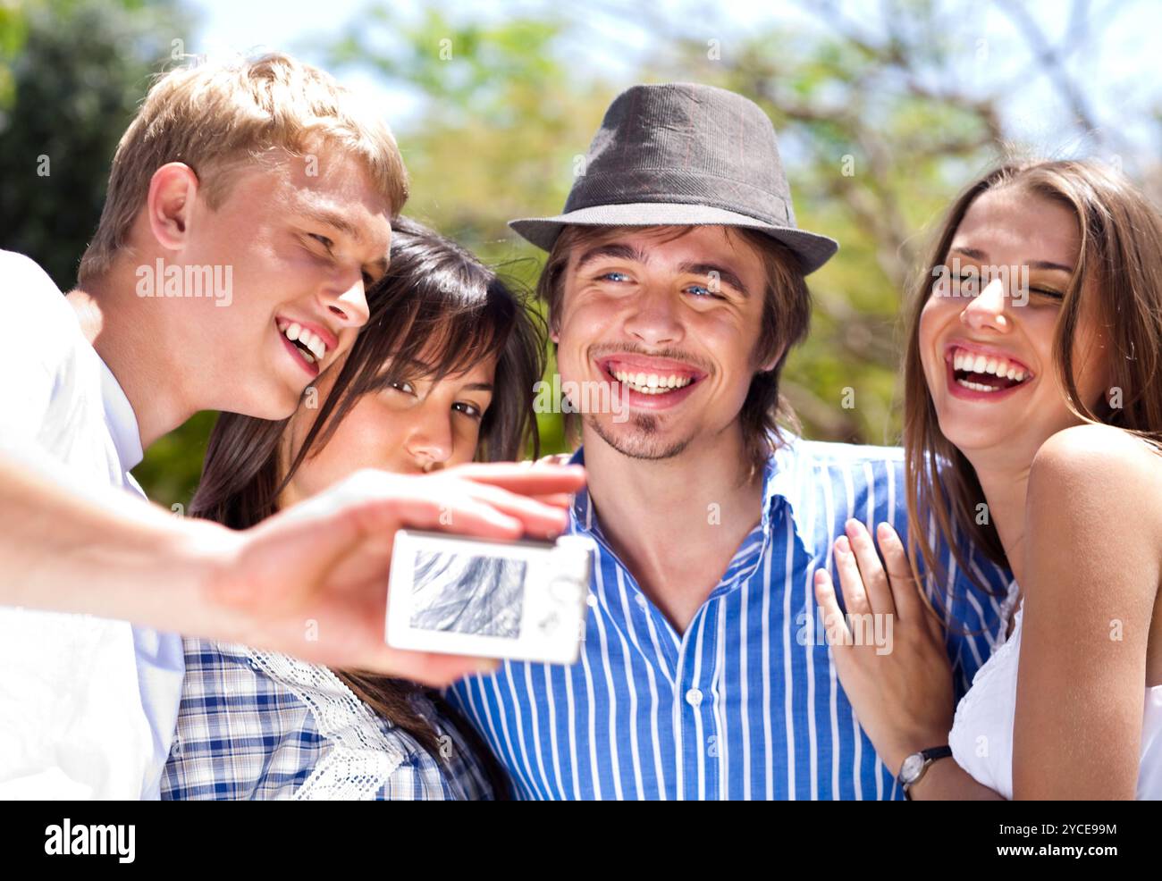 Group of happy smiling couples taking picture together Stock Photo - Alamy
