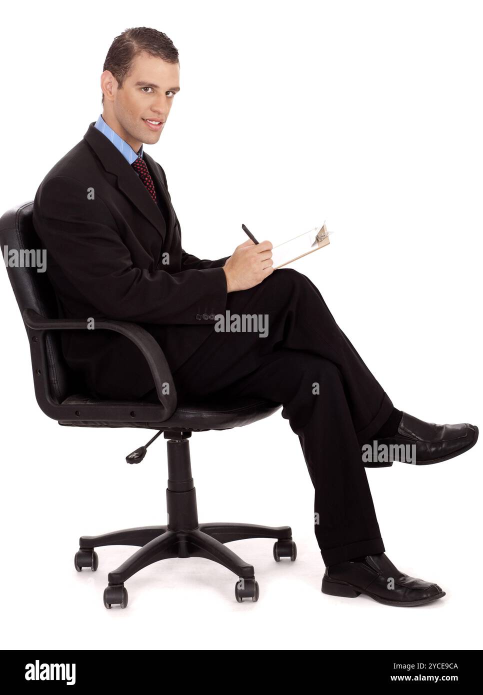 Professional business men taking notes Stock Photo - Alamy