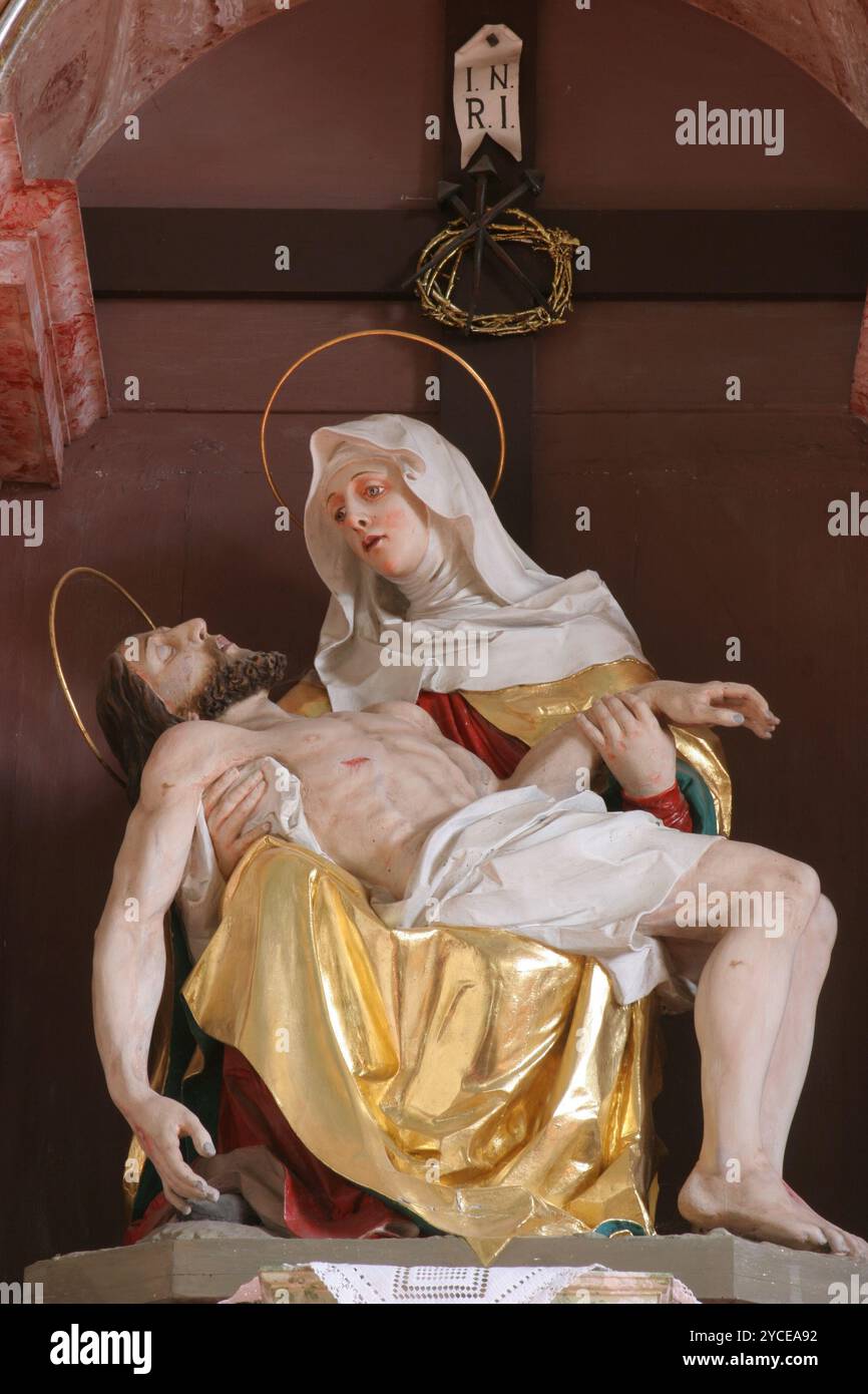 Pieta mary jesus statue cross hi-res stock photography and images - Alamy
