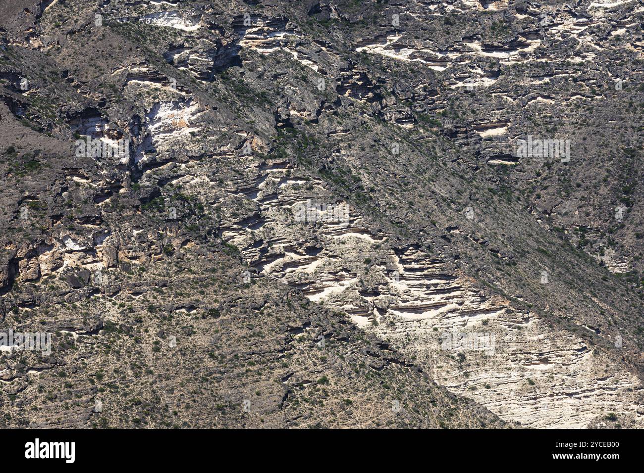 Rock face, weathered by wind and water, in the Dhofar Mountains, Dhofar ...