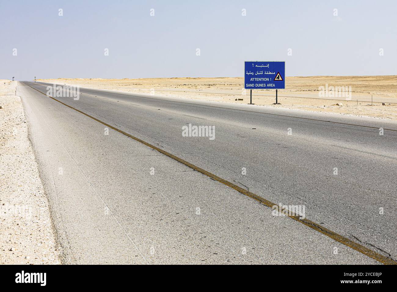Road sign with warning of sand dunes on the Mascat-Salalah-Road, Dhofar ...