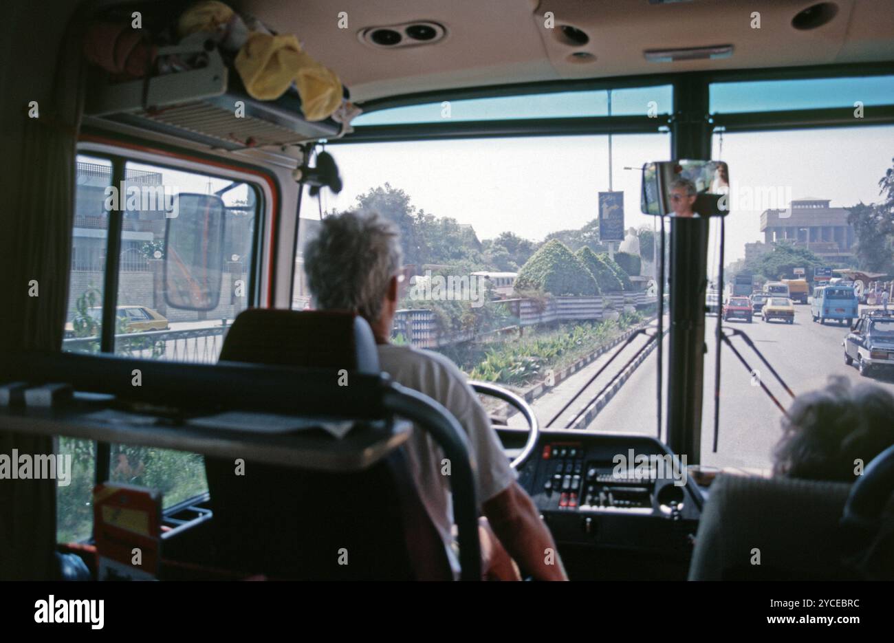 Bus ride through Pyramid Road to Giza, bus driver, pyramid-shaped trees ...