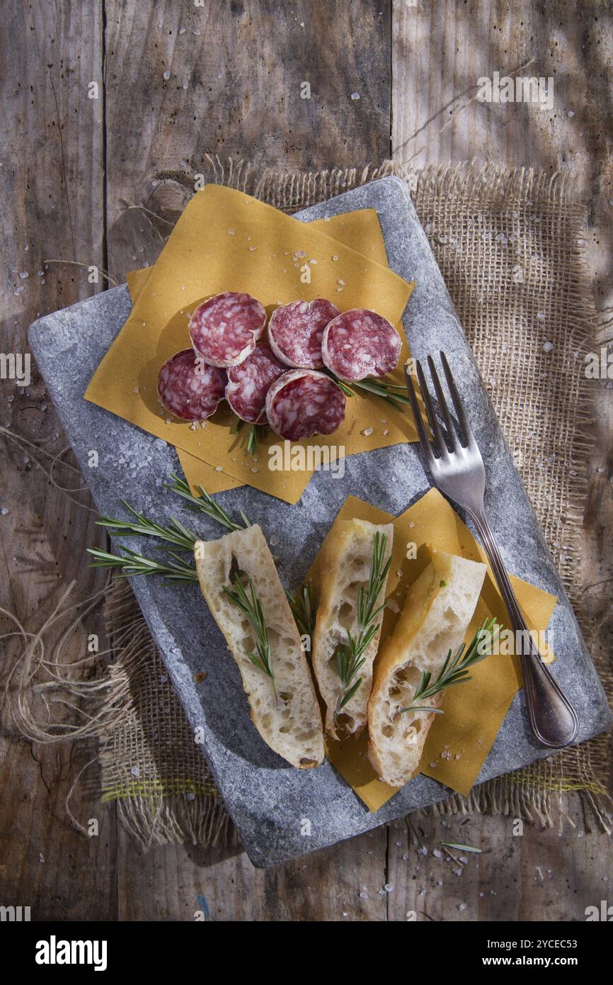 Presentation of the typical focaccia and Tuscan salami Stock Photo - Alamy