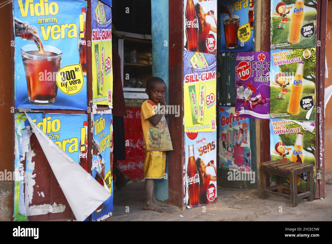 Africa, Madagascar, Fianarantsao, kiosk with colourful advertising ...