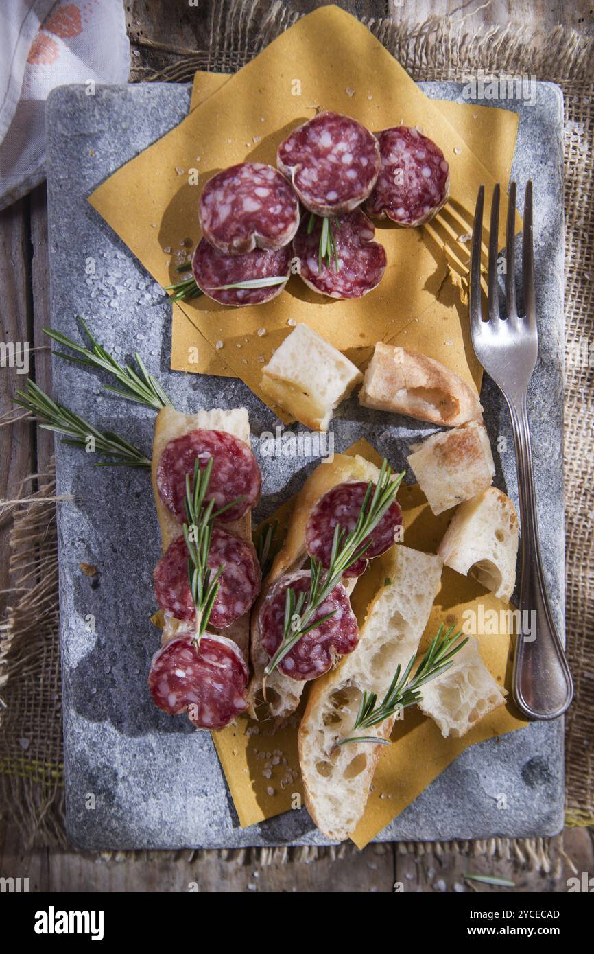 Presentation of the typical focaccia and Tuscan salami Stock Photo - Alamy
