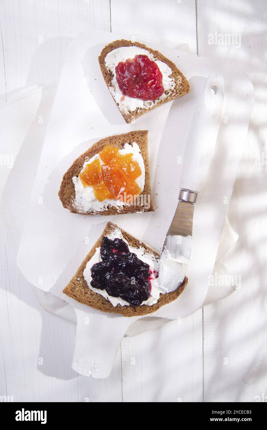 Italian breakfast made with whole wheat bread, butter and jam Stock ...
