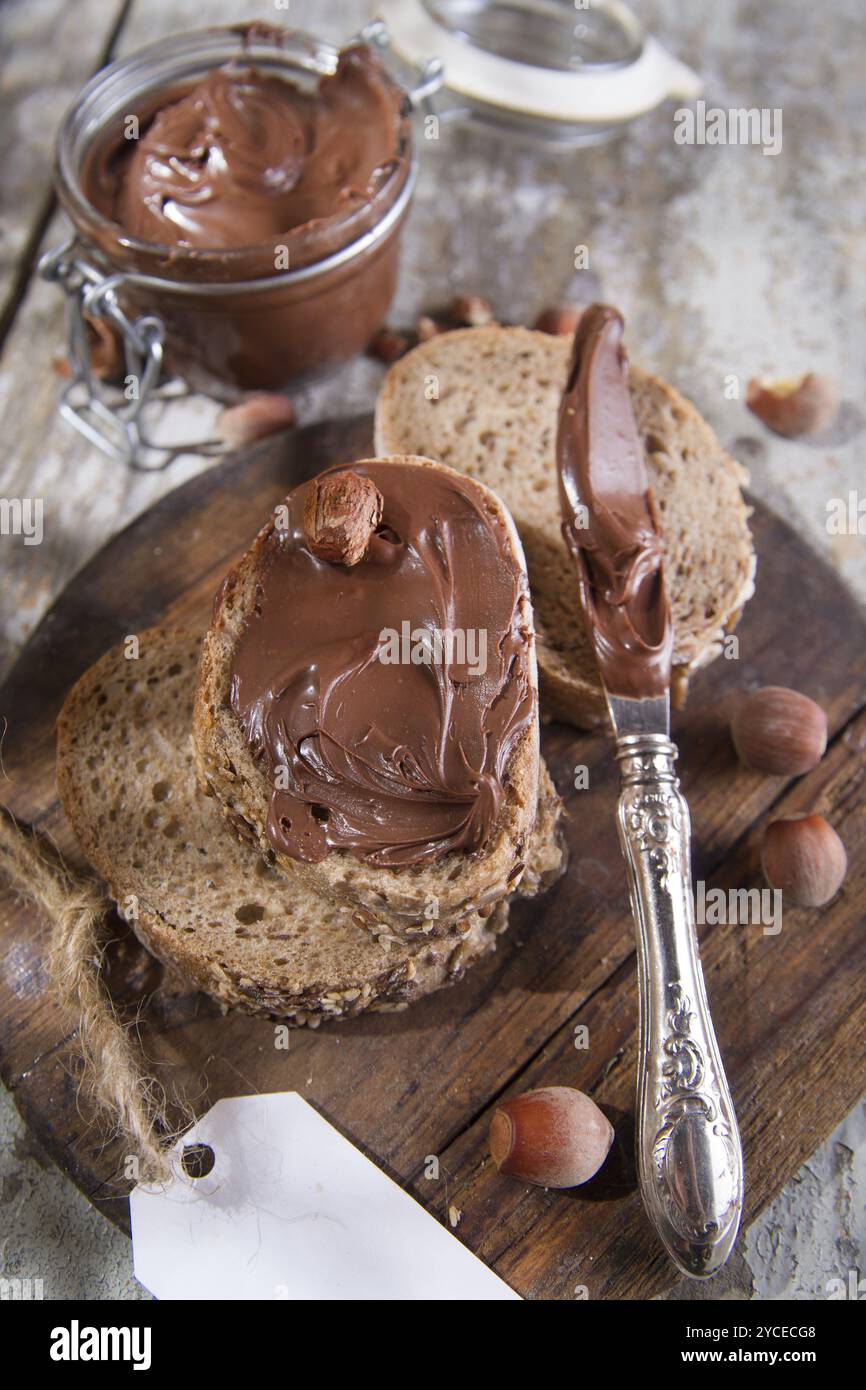 Breakfast with chocolate spread made with hazelnuts and cocoa sugar ...