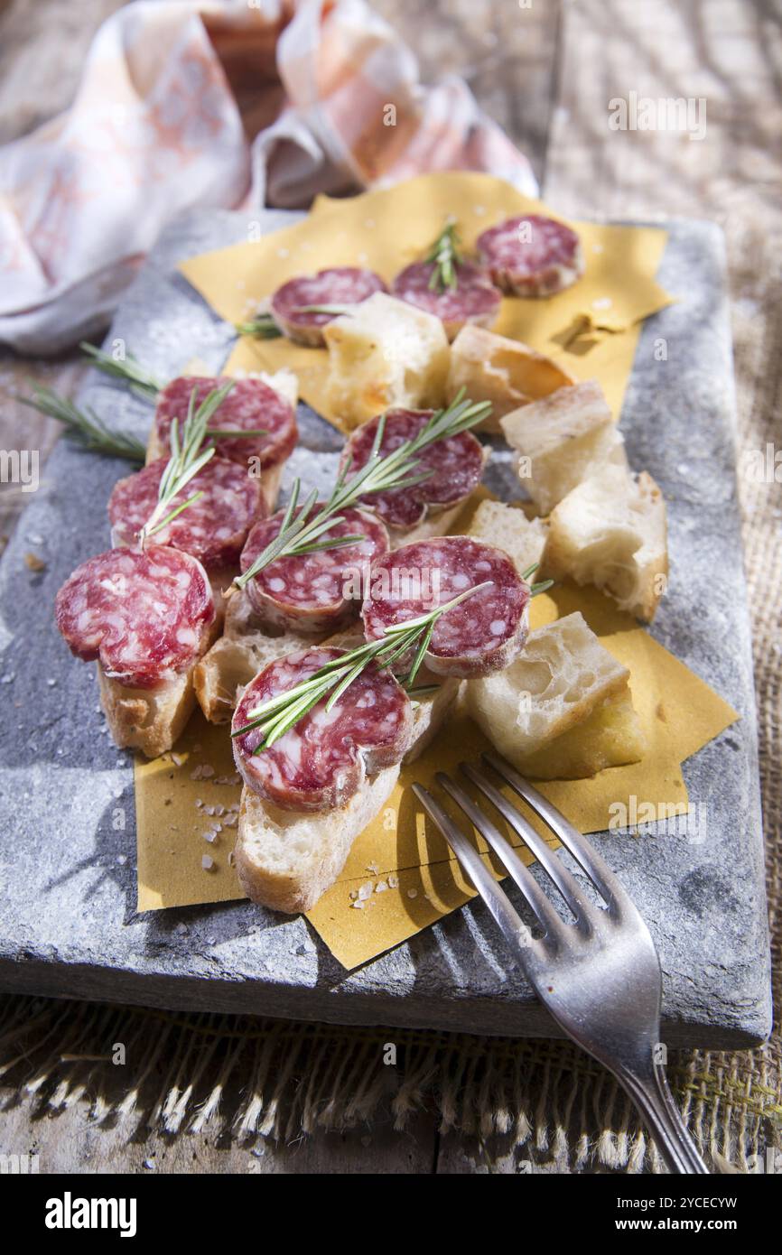 Presentation of the typical focaccia and Tuscan salami Stock Photo - Alamy