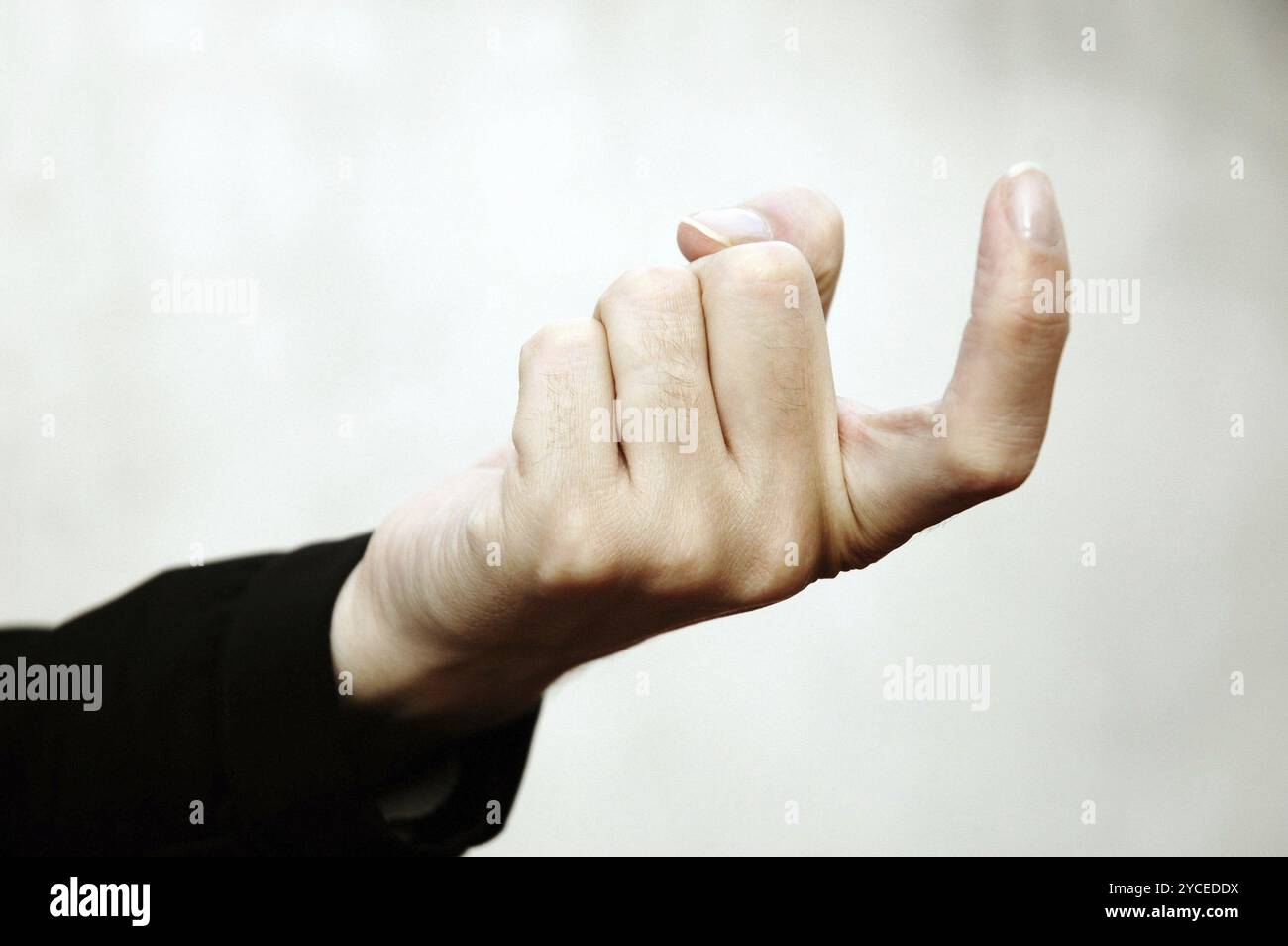 Hand Sign performing symbol language Stock Photo - Alamy