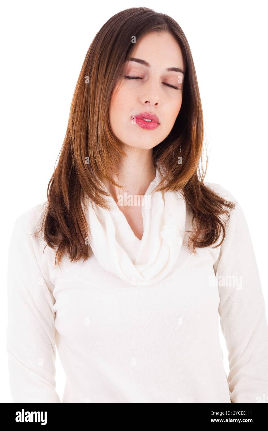 Pretty woman standing and closing her eyes on white background Stock ...