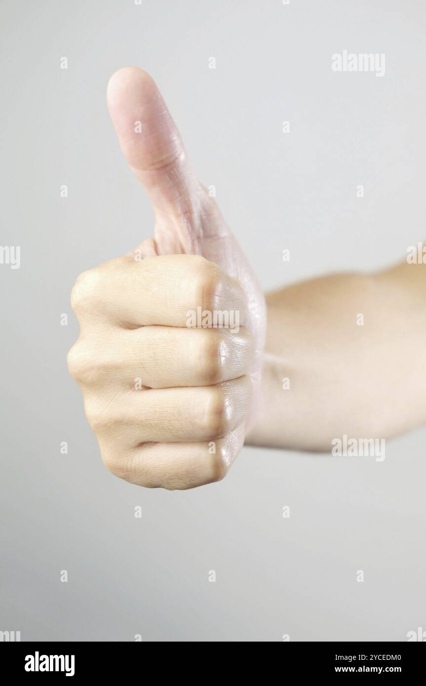 Hand Sign performing symbol language Stock Photo - Alamy