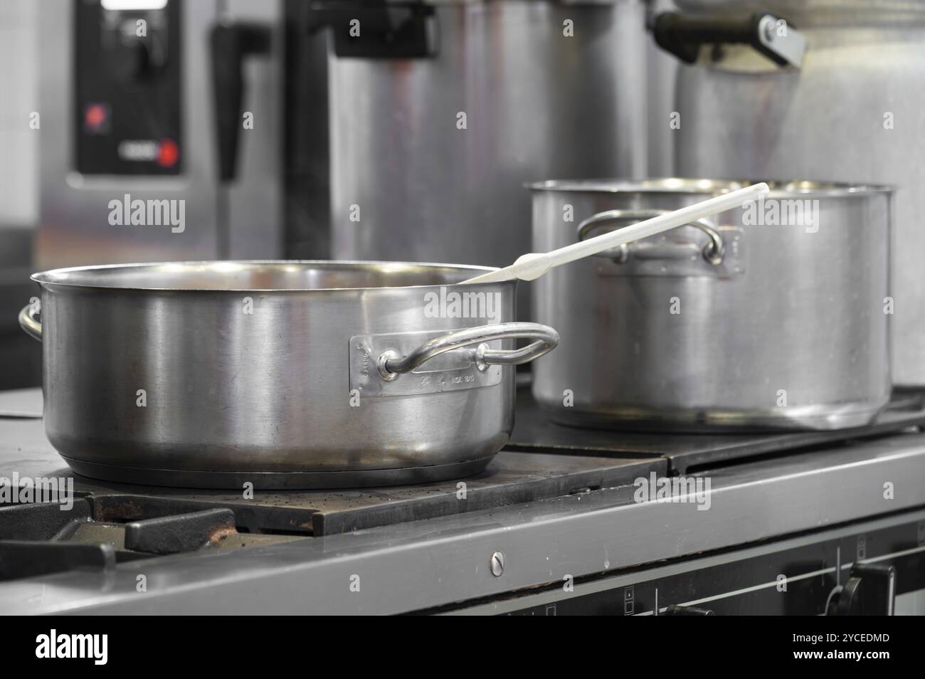 Close up view of casseroles at a commercial kitchen. Preparing and ...