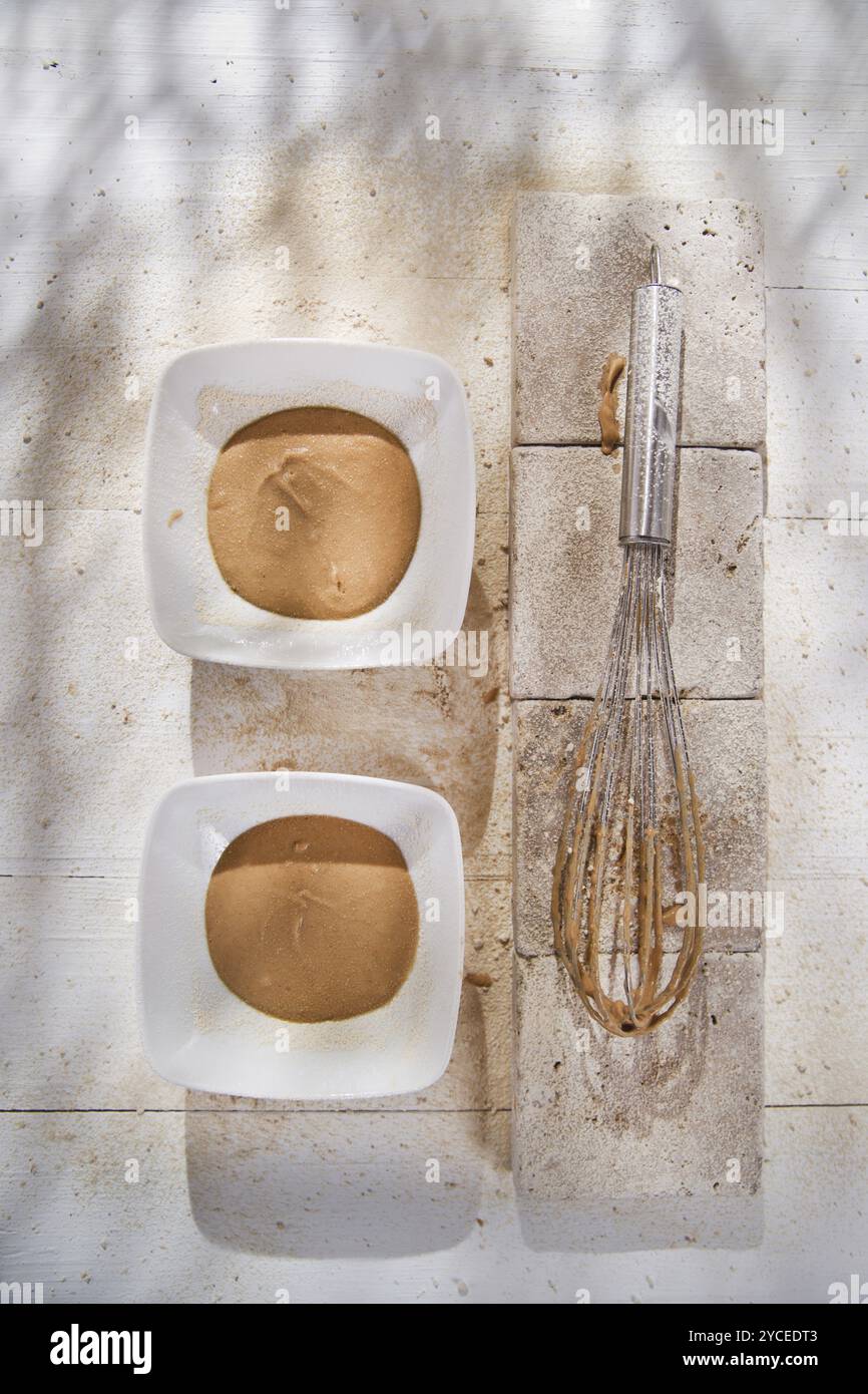 Whip for the preparation of the cream of chestnut flour Stock Photo - Alamy