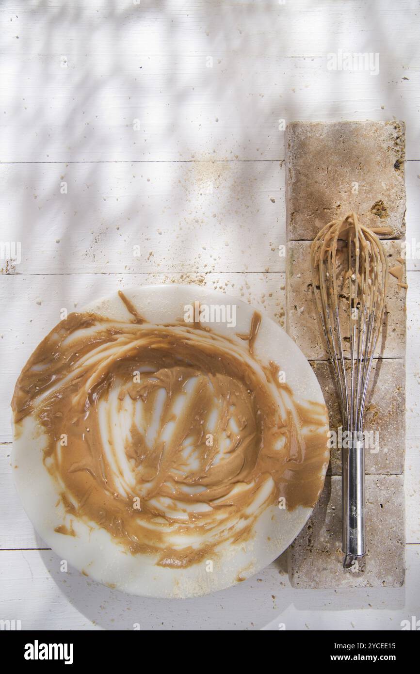 Whip for the preparation of the cream of chestnut flour Stock Photo - Alamy