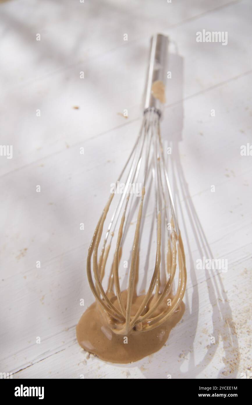 Whip for the preparation of the cream of chestnut flour Stock Photo - Alamy