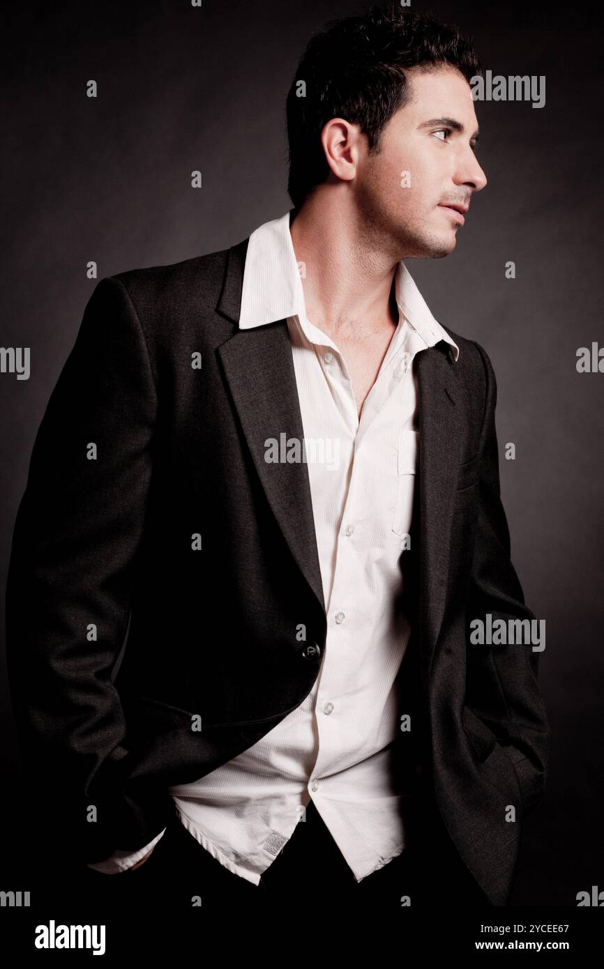 Man standing side view suit hi-res stock photography and images - Alamy