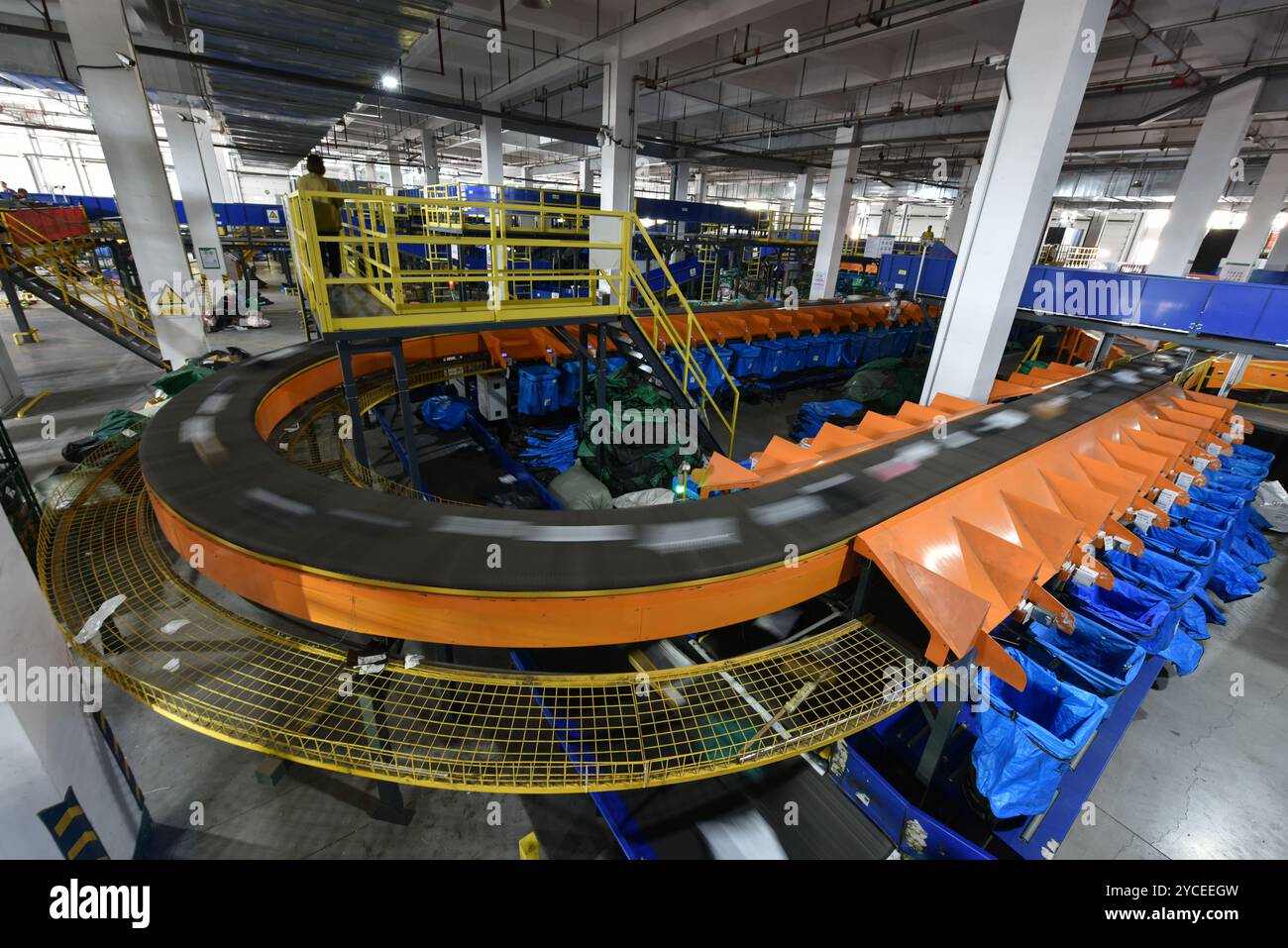 FUYANG, CHINA - OCTOBER 23, 2024 - Employees of China Post Express ...