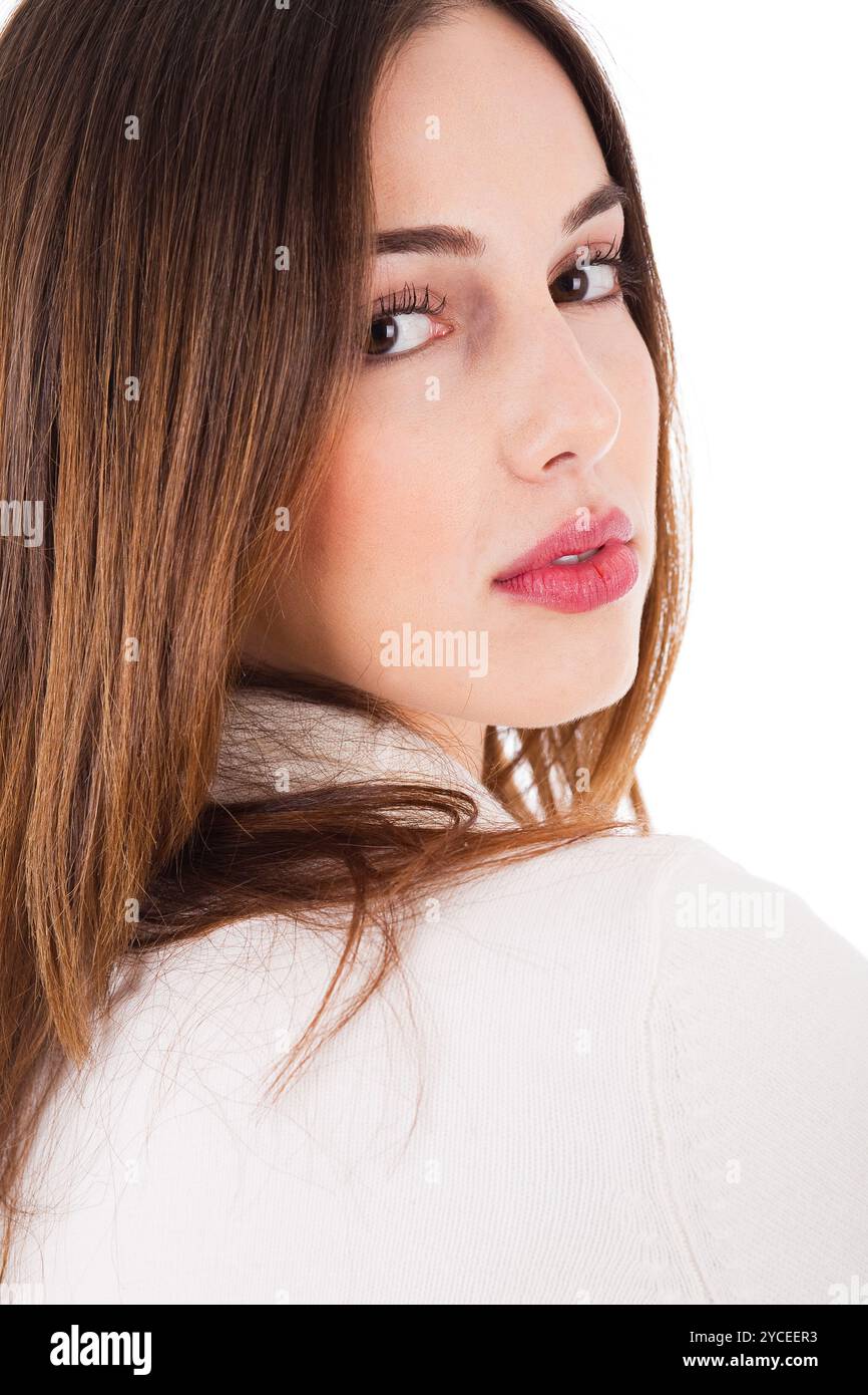 young brunette model side pose on isolated white background Stock Photo ...