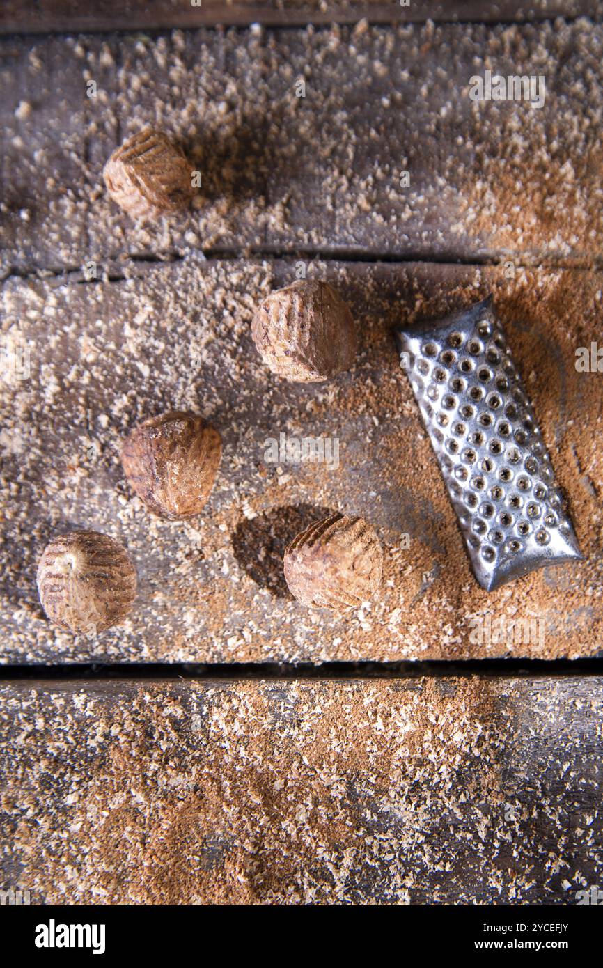 Detail of the grating of nutmeg flavor unique to particular foods and ...