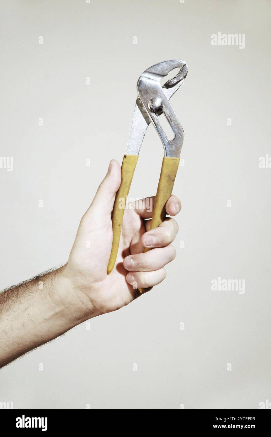 Hand with Tweezers on white background Stock Photo - Alamy
