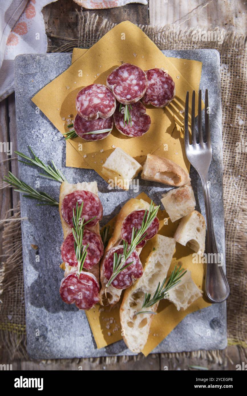 Presentation of the typical focaccia and Tuscan salami Stock Photo - Alamy