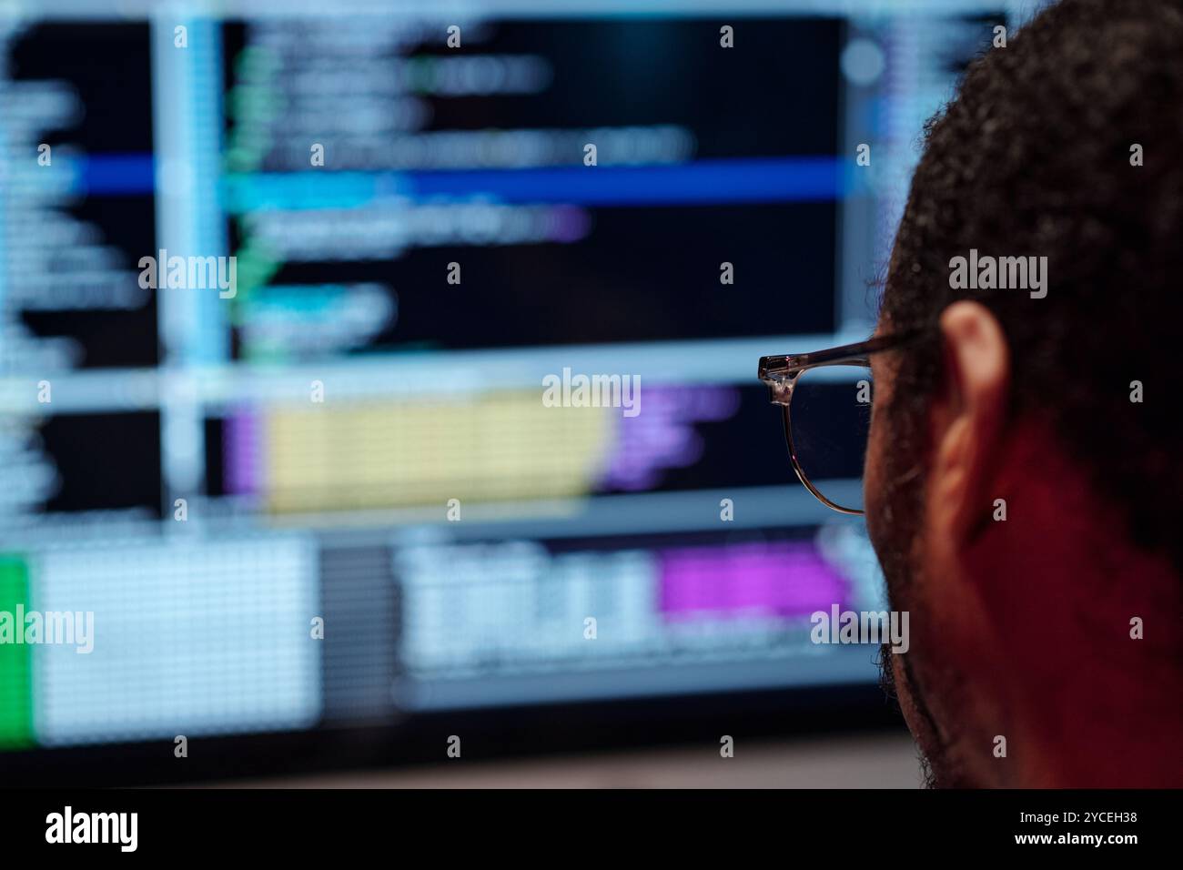 Analyzing Code on Computer Screen with Focused Mind Stock Photo - Alamy