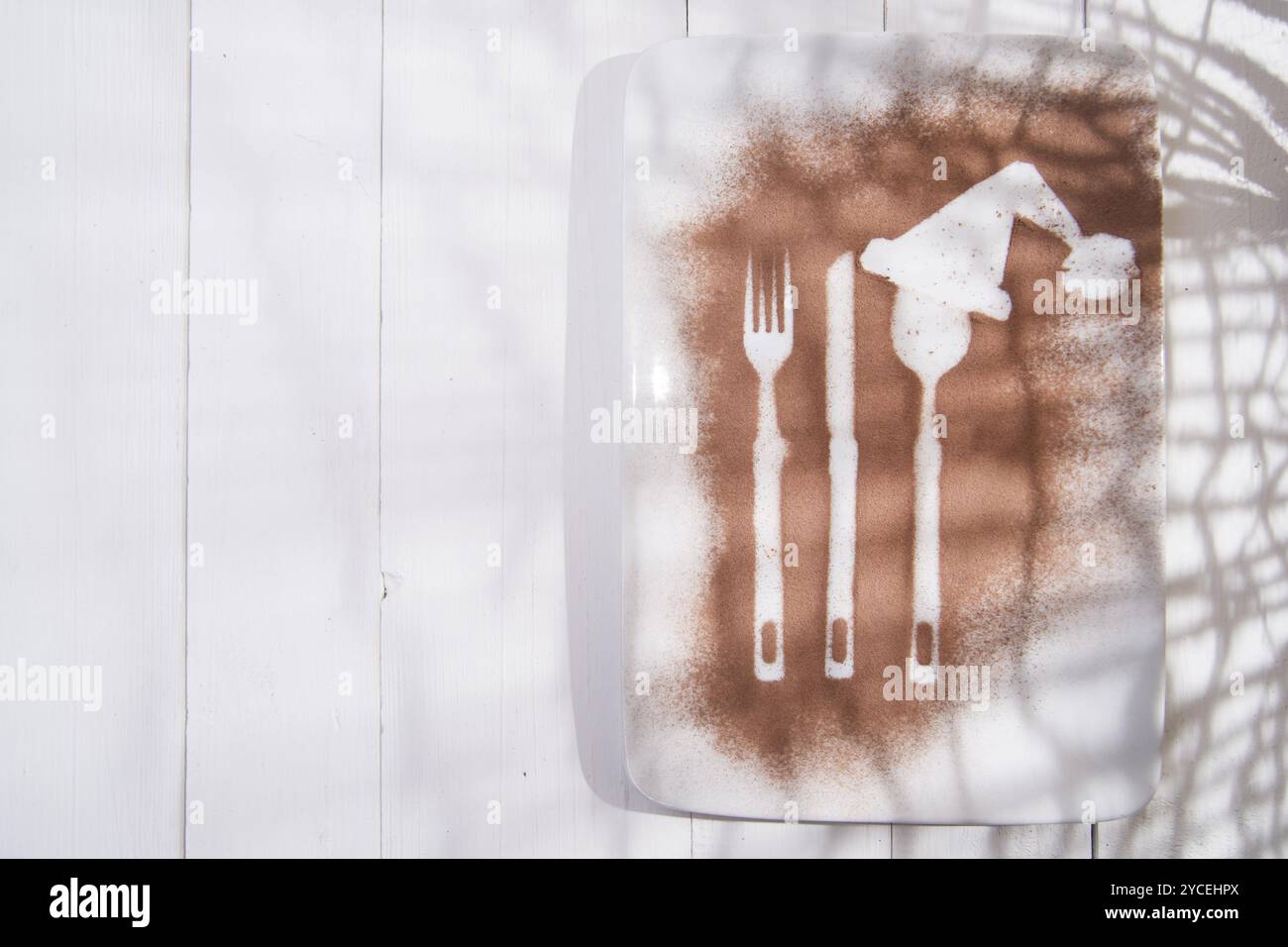 Representation of the Christmas holiday with cutlery on the plate and a ...