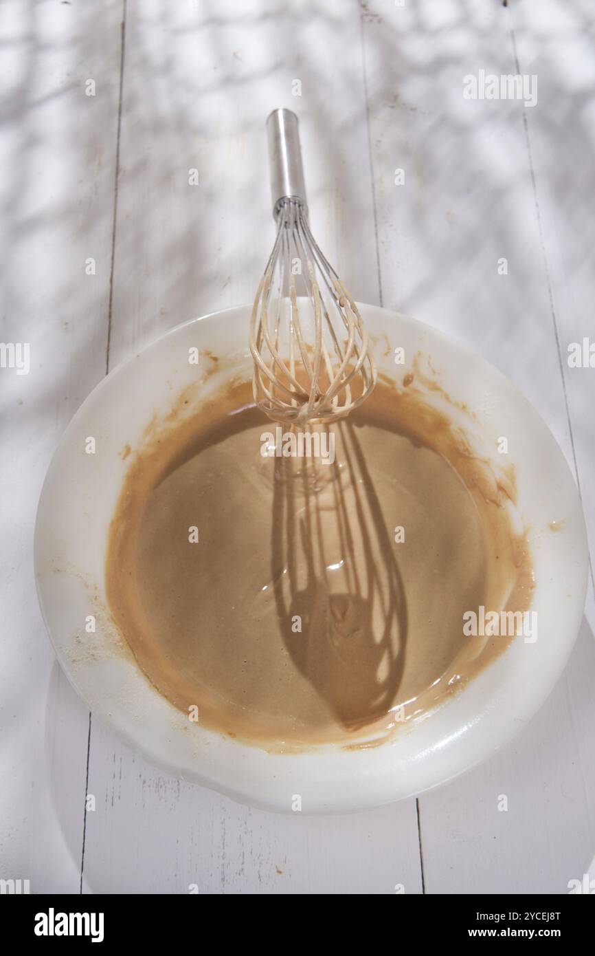 Whip for the preparation of the cream of chestnut flour Stock Photo - Alamy