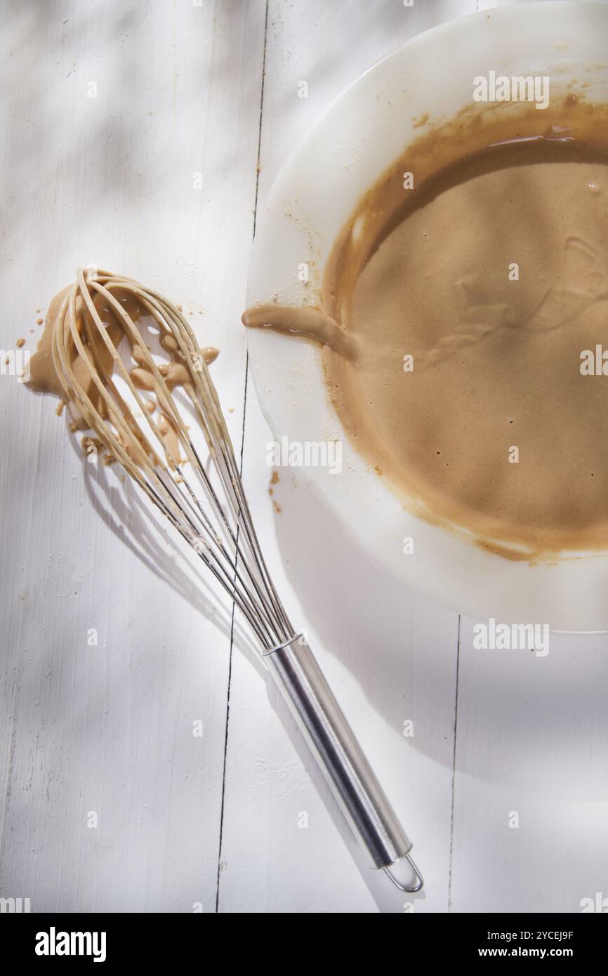 Whip for the preparation of the cream of chestnut flour Stock Photo - Alamy