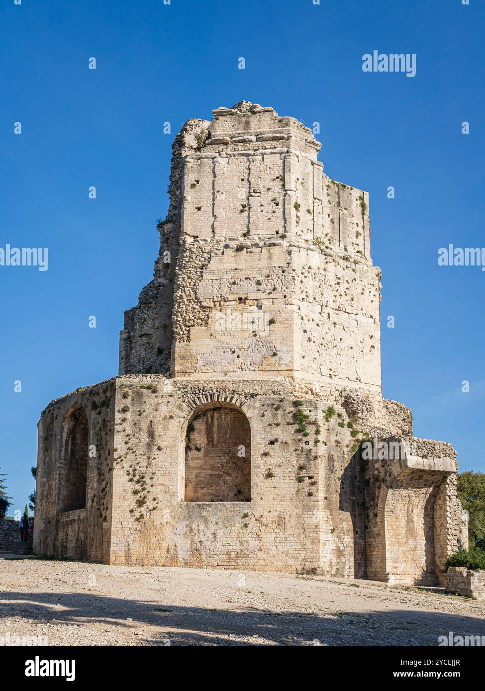 Scenic vertical view of roman monument Magne Tower aka Tour Magne ...