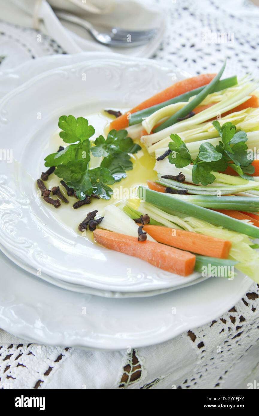 Preparation and presentation of mixed vegetables for garnish Stock ...
