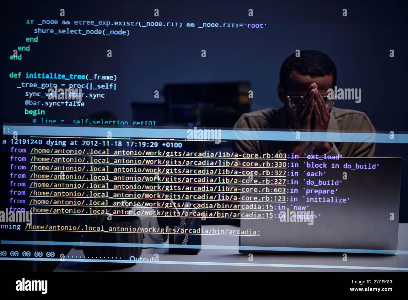 Analyzing Code with Concentration on Computer Screen Stock Photo - Alamy