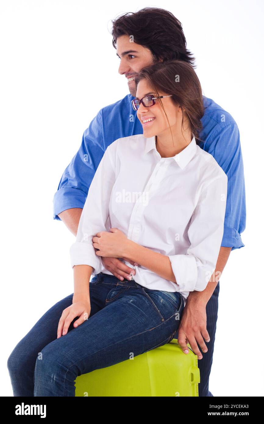 Smiling romantic young couple side view Stock Photo - Alamy
