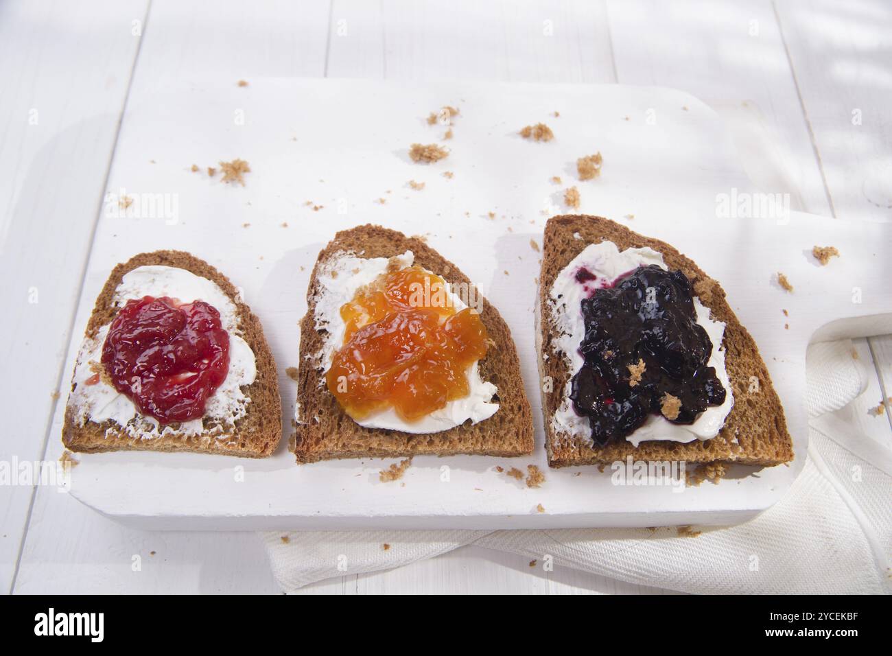 Italian breakfast made with whole wheat bread, butter and jam Stock ...
