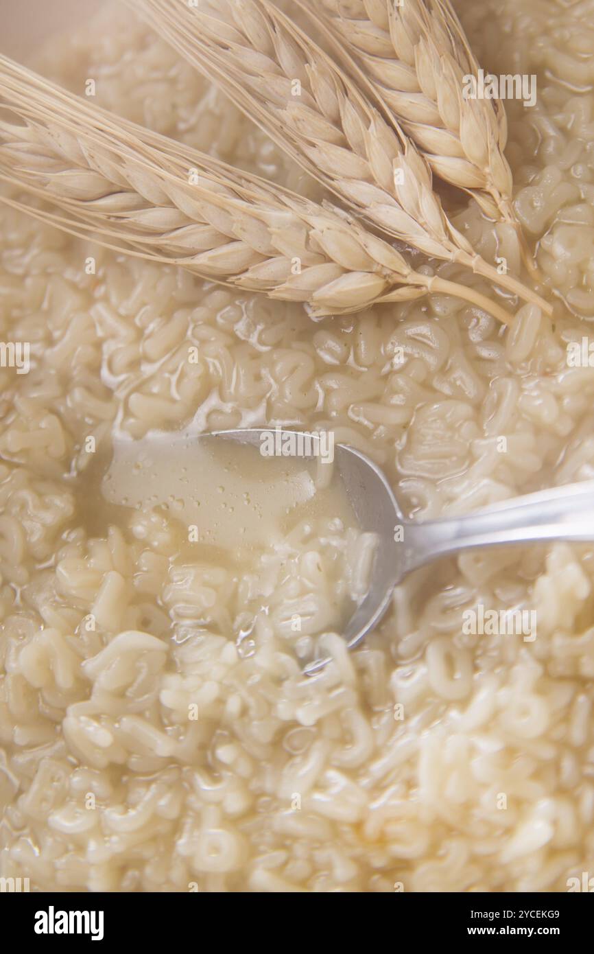 Soup of pasta in the form of letters of the alphabet to children's ...