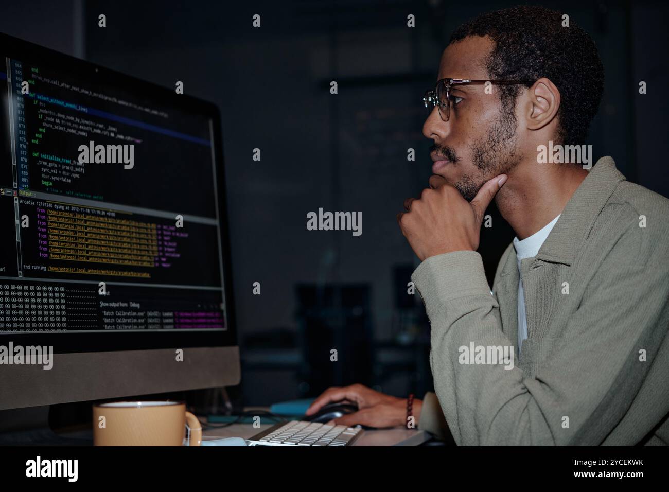 Focused Programmer Working on Code at Computer Stock Photo - Alamy