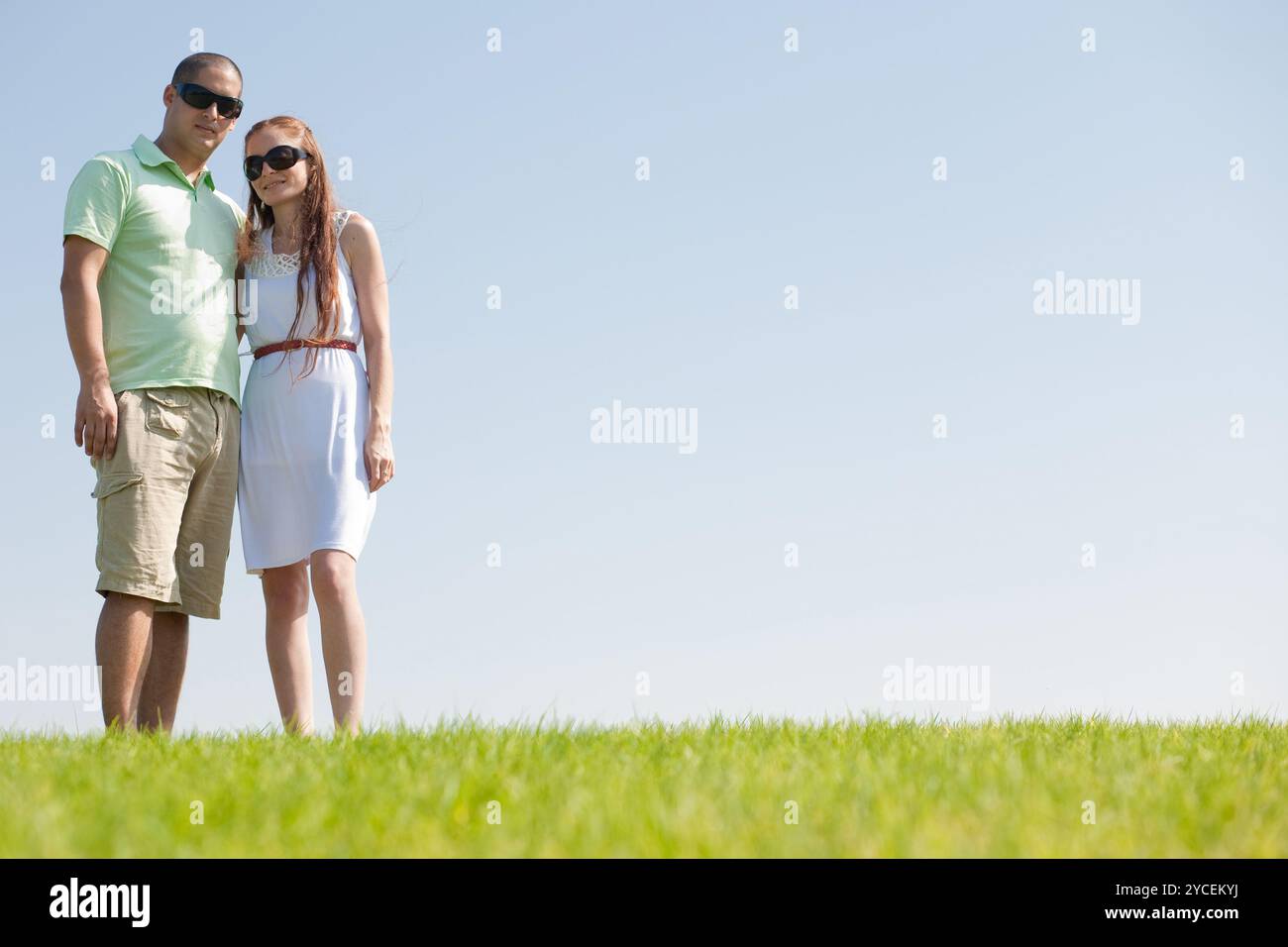 Young couple hug Stock Photo - Alamy