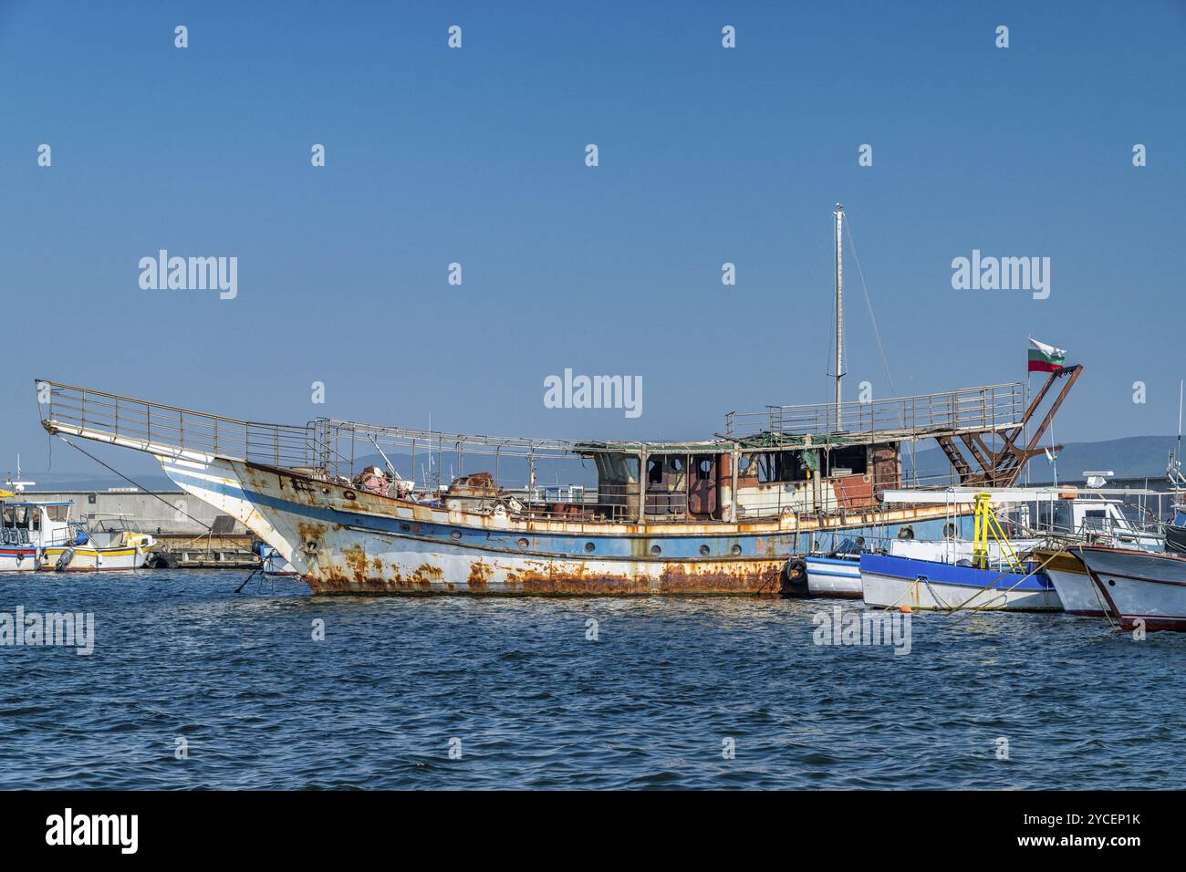 Old rusted Fishing Boat docked at a harbor port in Nessebar ancient ...