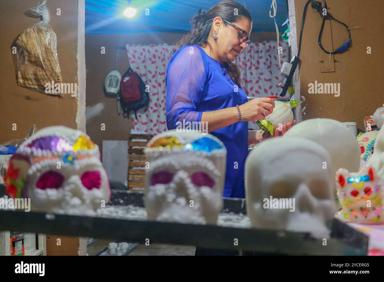 Day of the Dead Sugar Skulls Production Clay molds for sugar skulls are ...