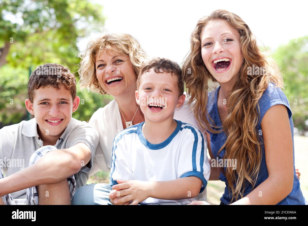Mother with grown up daughter and son in the park smiling and having fun Stock Photo - Alamy