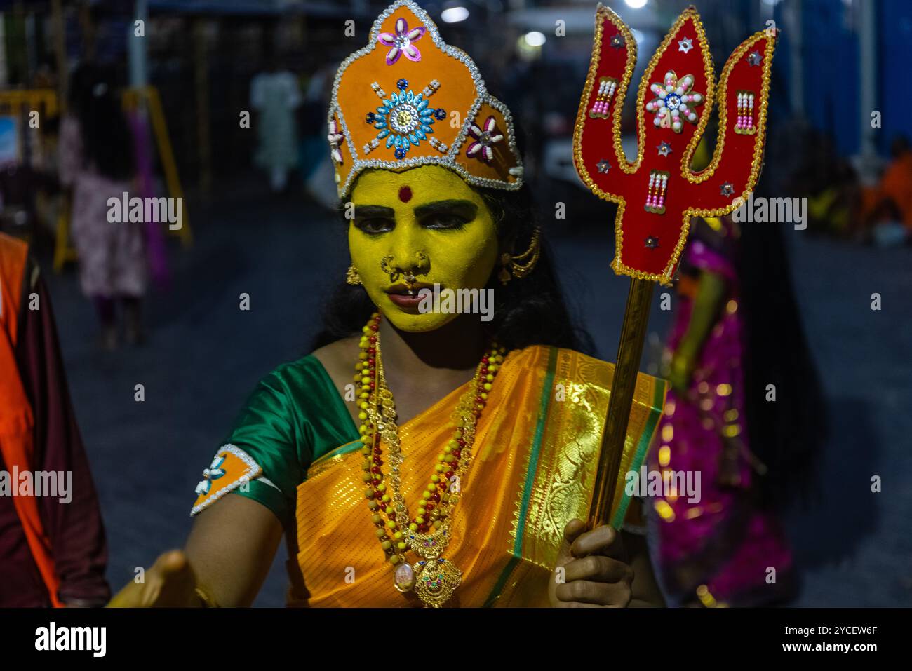 Kulasai Dasara, Portrait of indian hindu devotee with painted face and ...