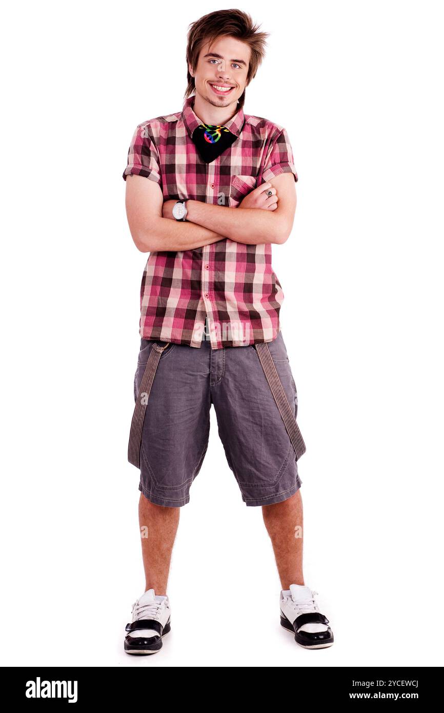 Full length view of stunning model smiling at camera and standing ...