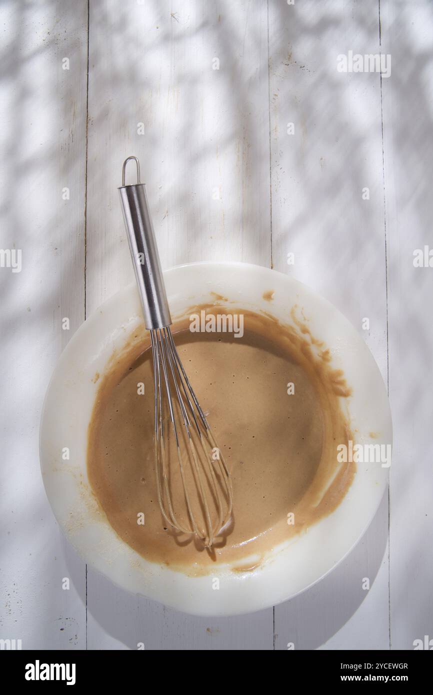 Whip for the preparation of the cream of chestnut flour Stock Photo - Alamy