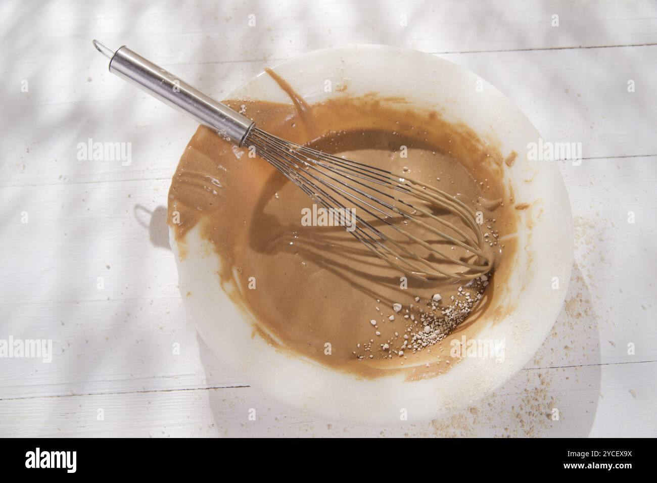 Whip for the preparation of the cream of chestnut flour Stock Photo - Alamy