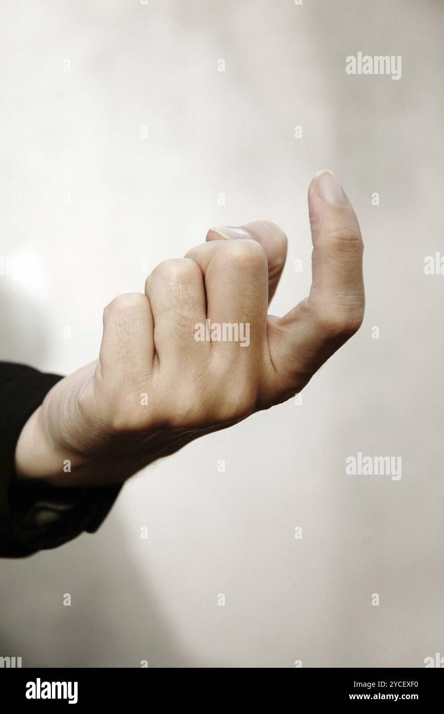 Hand Sign performing symbol language Stock Photo - Alamy