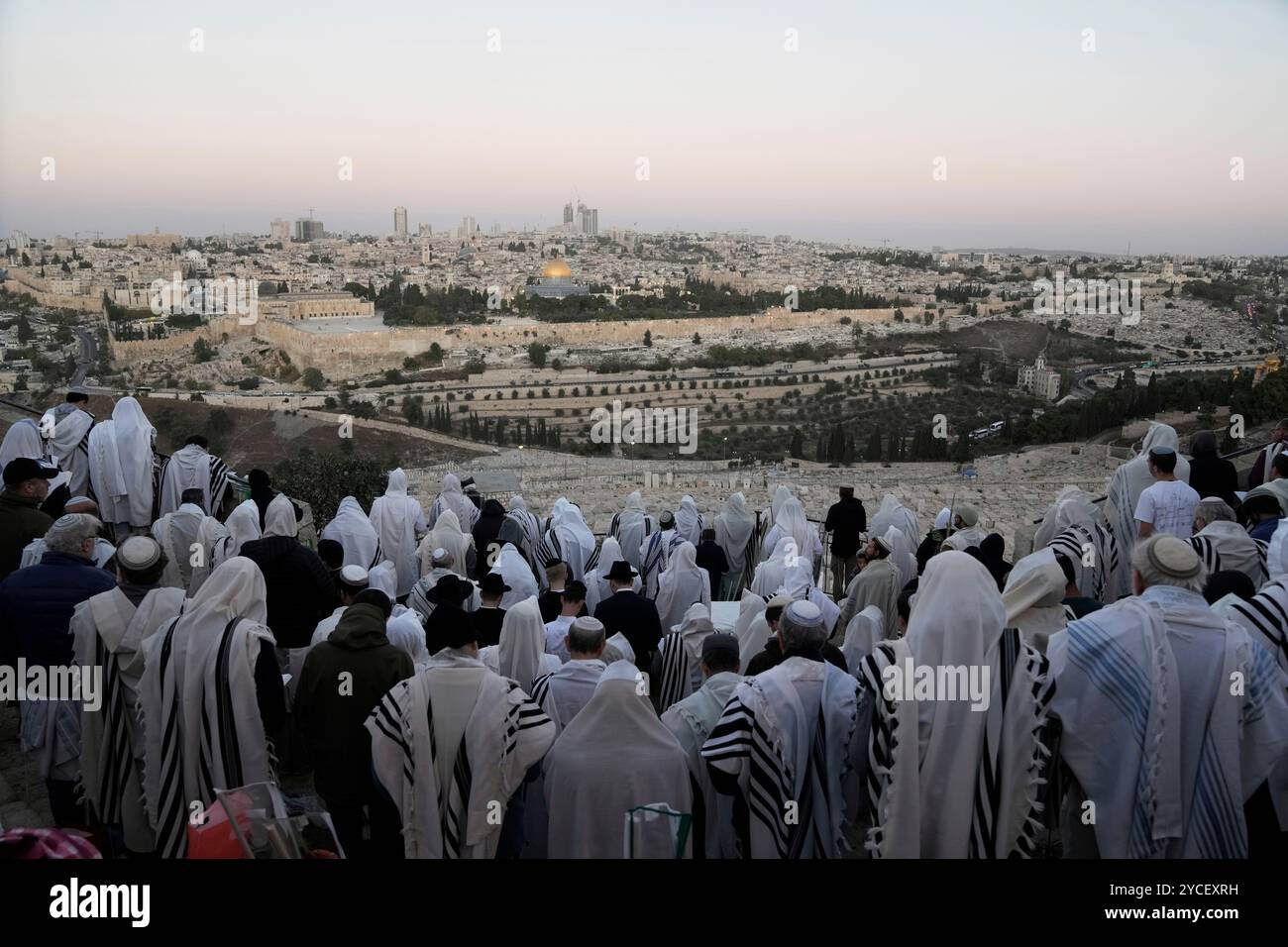 Ultra-Orthodox Jews wearing prayer shawls perform the Hoshana Rabbah ...